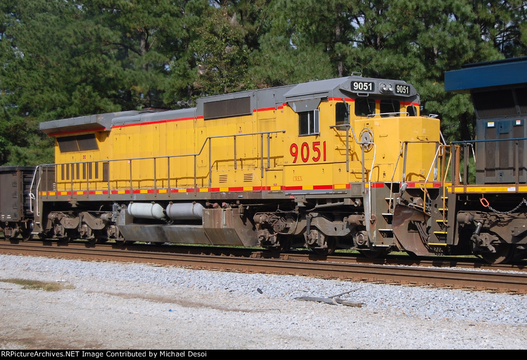 CREX C40/8 #9051 (ex UP) is the second unit on this southbound at Collier Yard